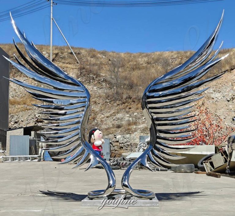 Modern Stainless Steel Wing Sculpture with Circle